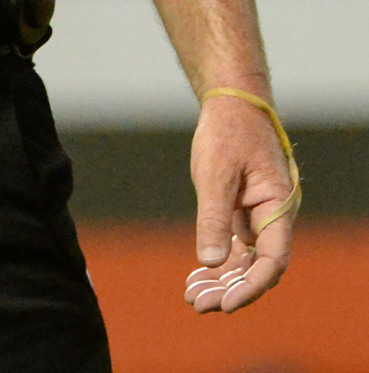 Keeping up with the downs: Referee John Parry uses an old-school method ...